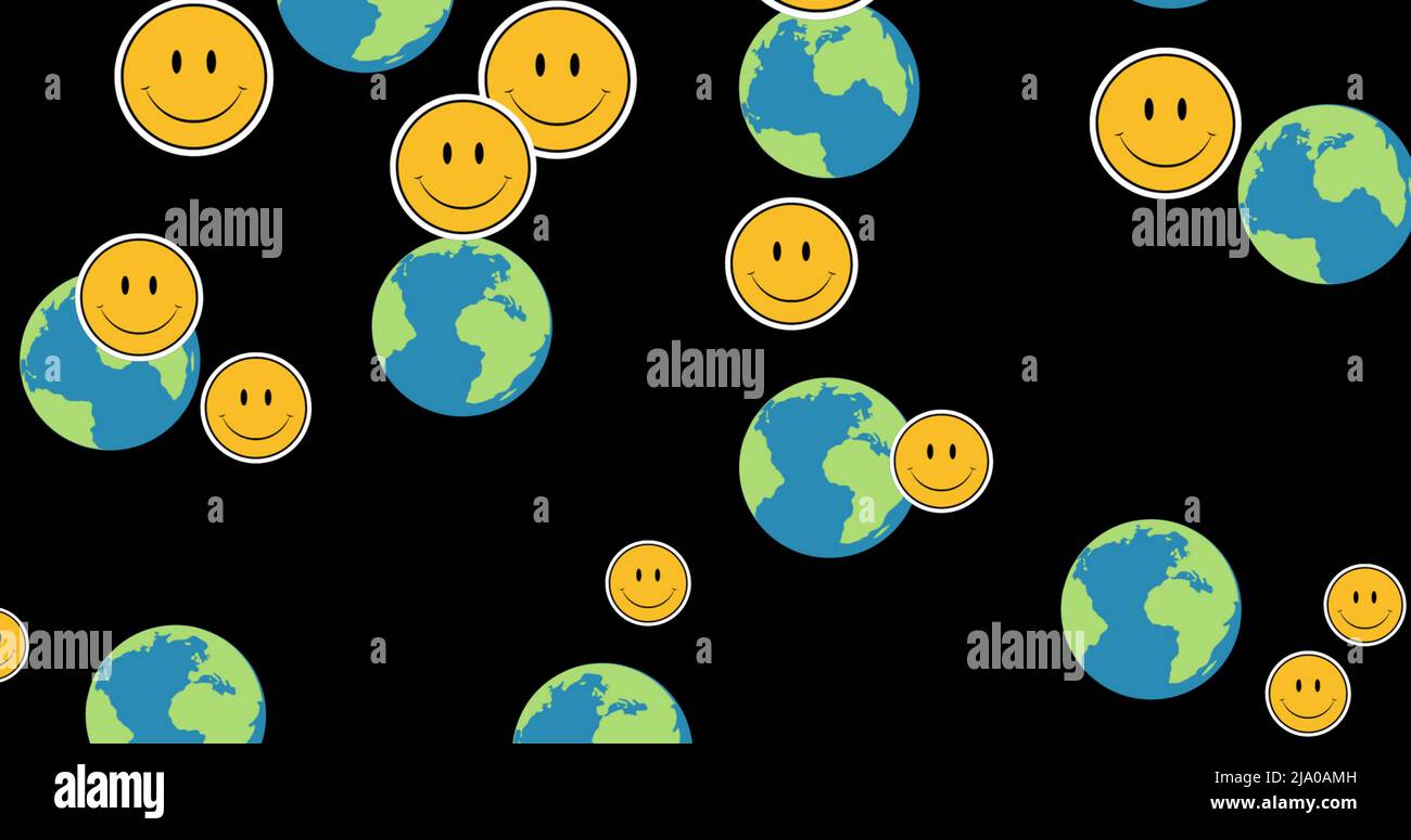 Image of smiling emoticons floating over globes on black background ...