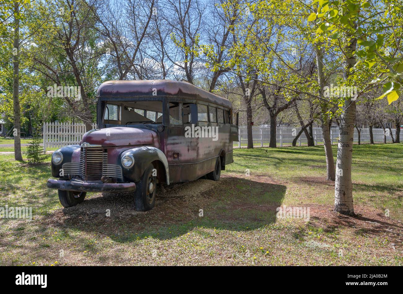 Old abandoned school bus at East Coulee in the Red Deer River valley ...