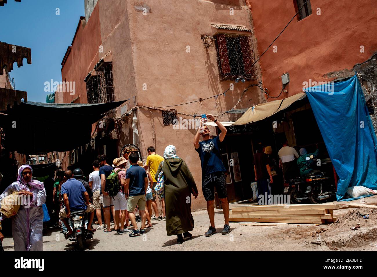 Daily life scene in the traditional Medina and zoco streets of ...