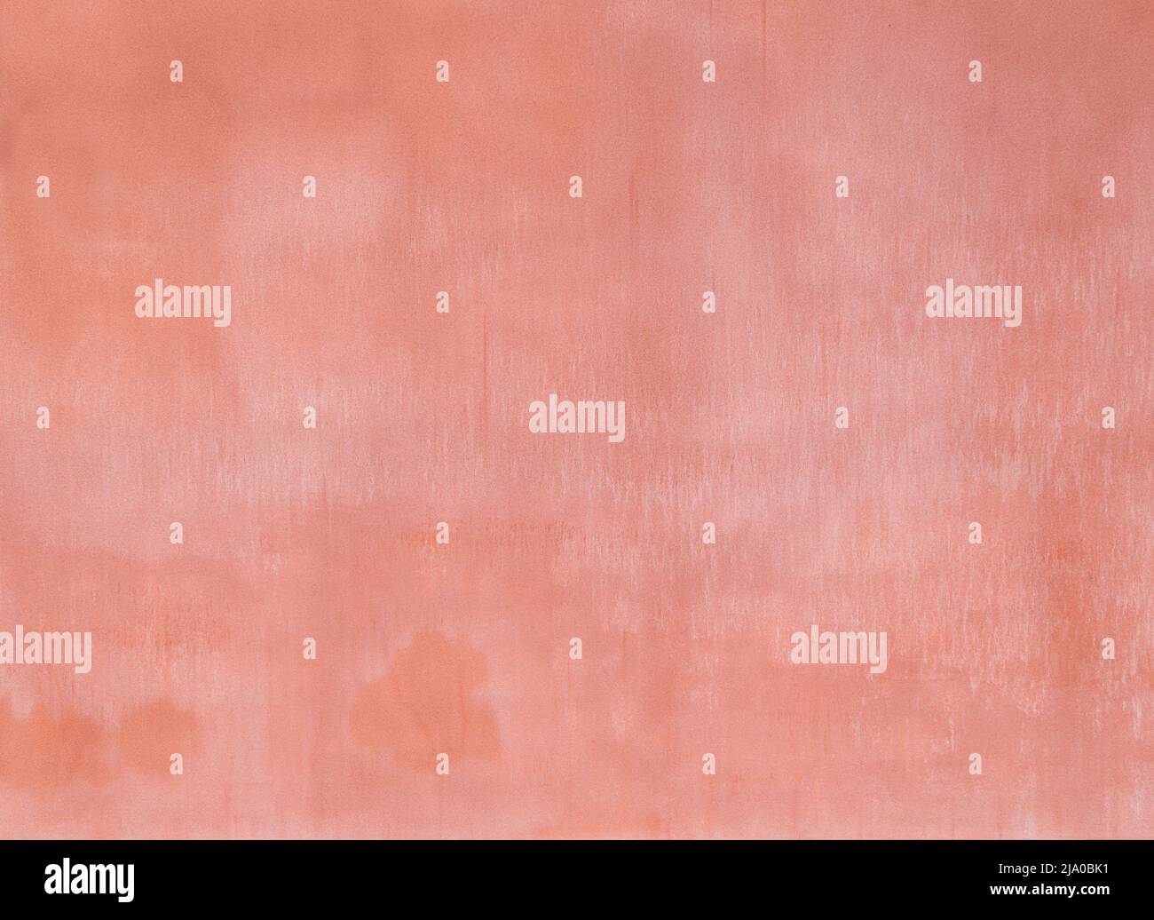 Plastered, weathered and painted pinkish, reddish peach colored ...