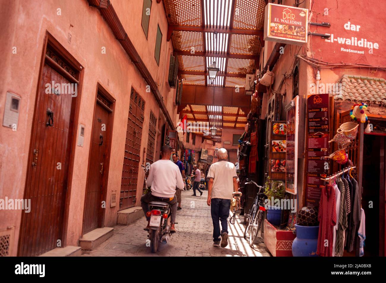 Daily life scene in the traditional Medina and zoco streets of ...
