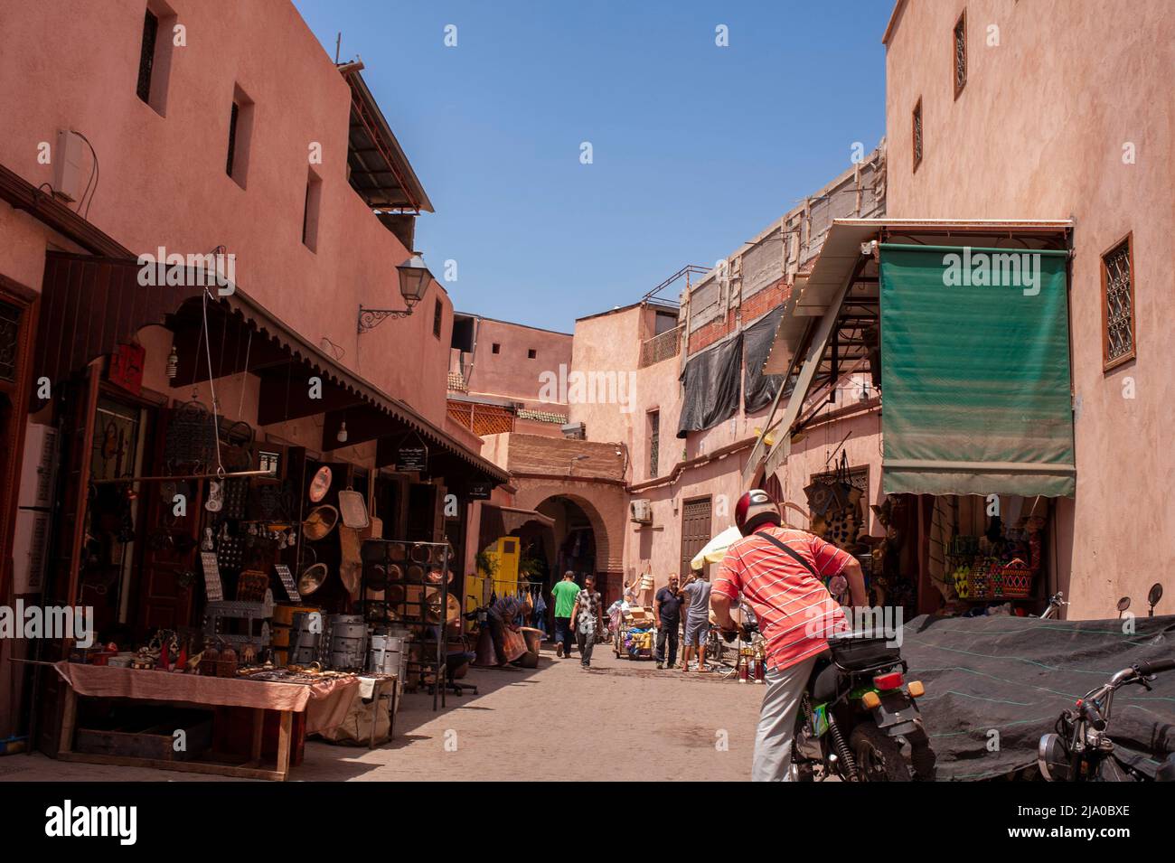 Daily life scene in the traditional Medina and zoco streets of ...