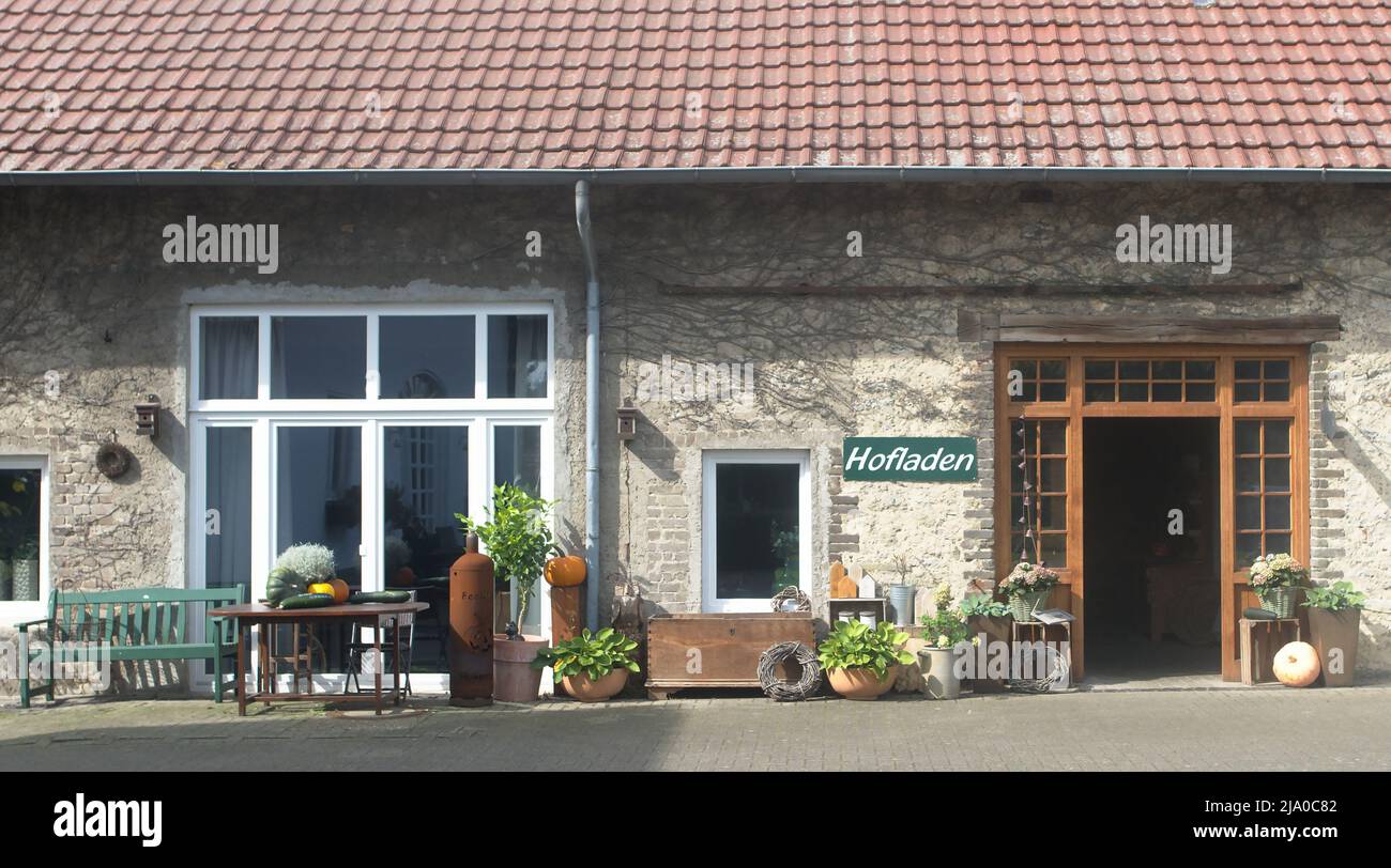 Farm shop front view stone windows doors flowers Stock Photo - Alamy