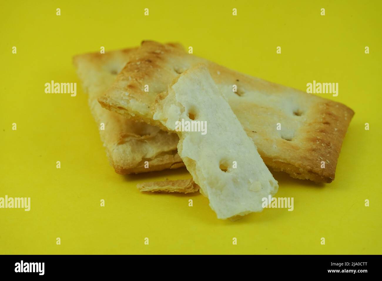 Delicious square cracker holes hi-res stock photography and images - Alamy