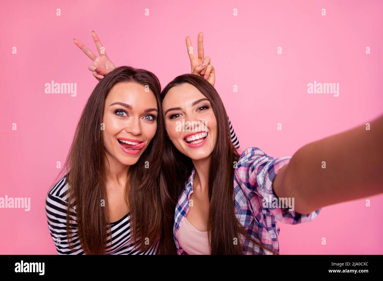 Peace sign over head hi-res stock photography and images - Alamy