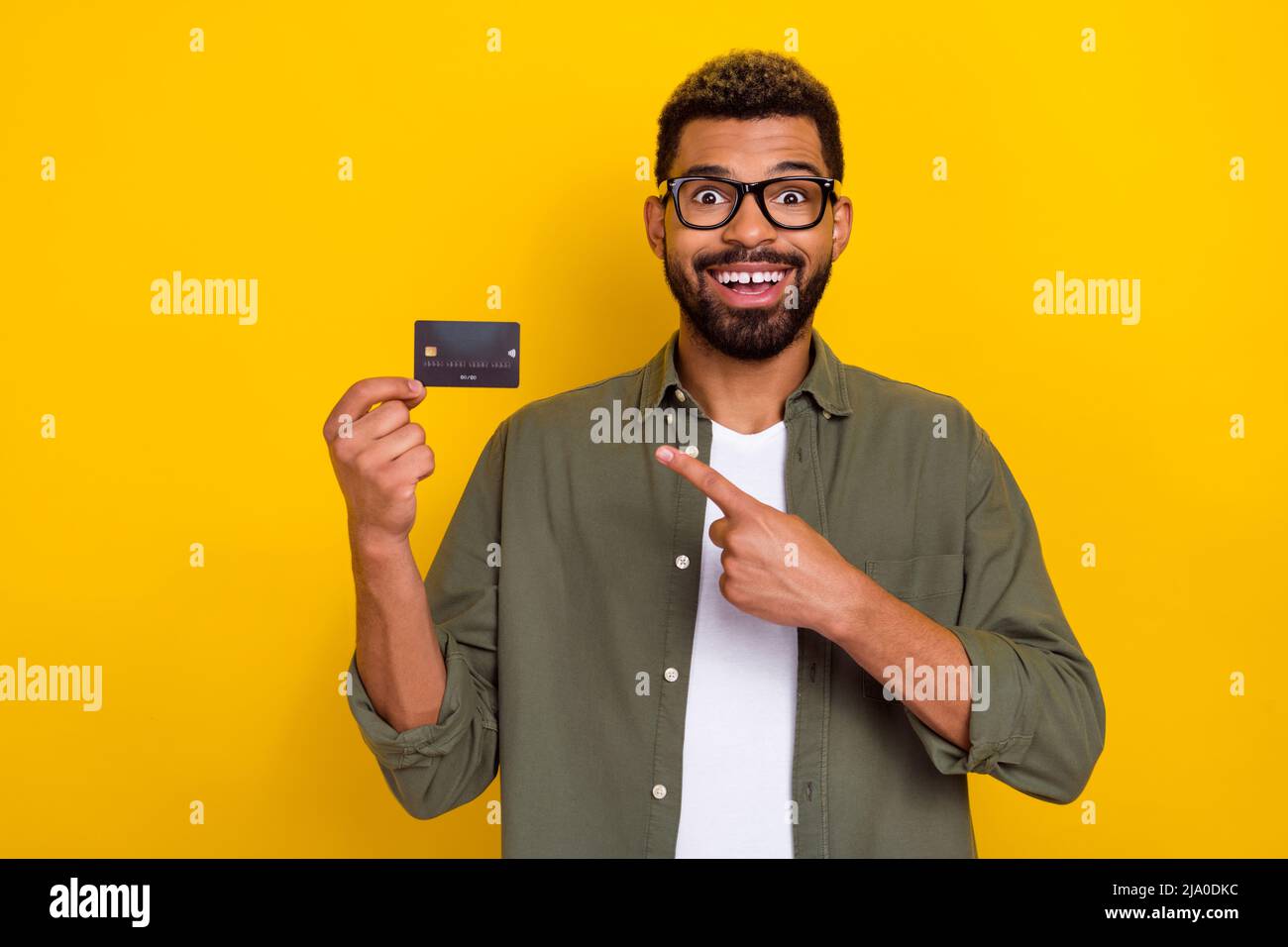Photo of funky funny guy dressed green shirt arm eyewear pointing bank ...