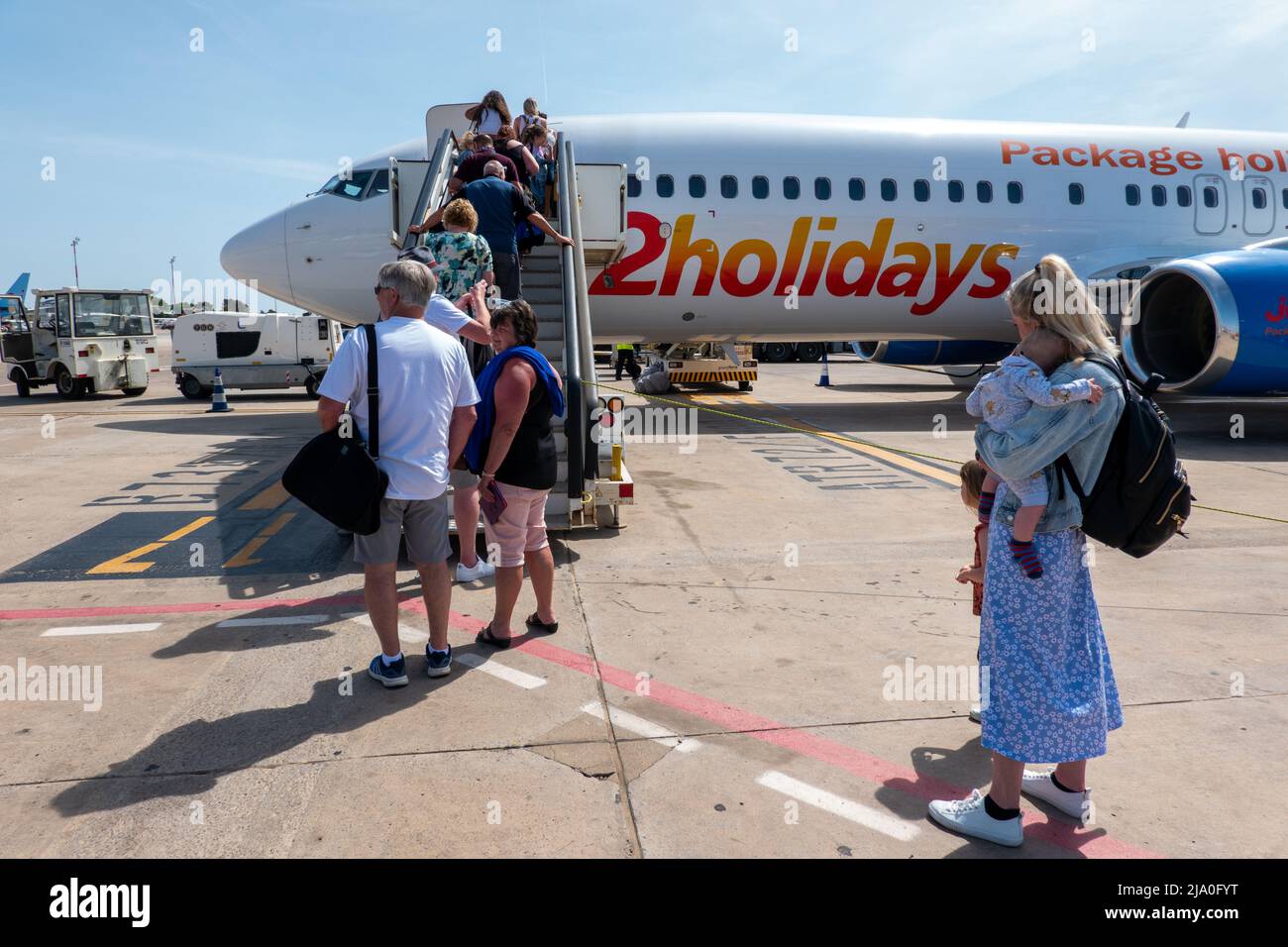 Picture dated May 2022 shows holidaymakers boarding a Jet2 aircraft at ...