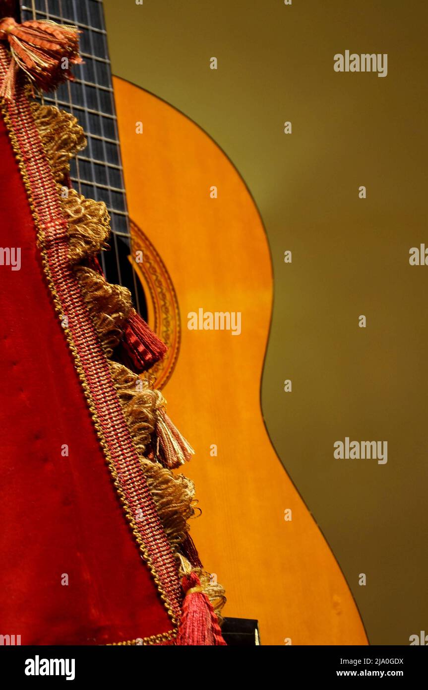 Classical guitar closeup on a dark background Stock Photo - Alamy