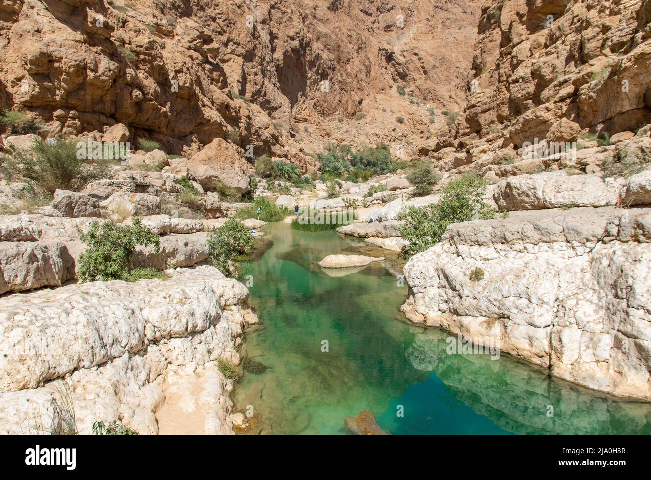 Famous of its vertical cliffs and the green water, Wadi Shab is one of ...