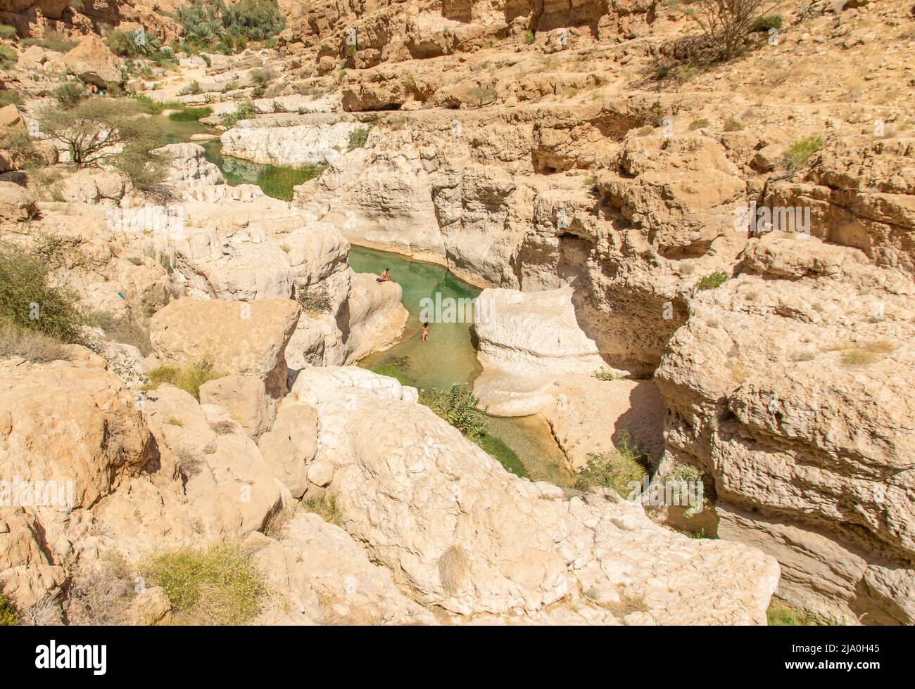 Famous of its vertical cliffs and the green water, Wadi Shab is one of ...