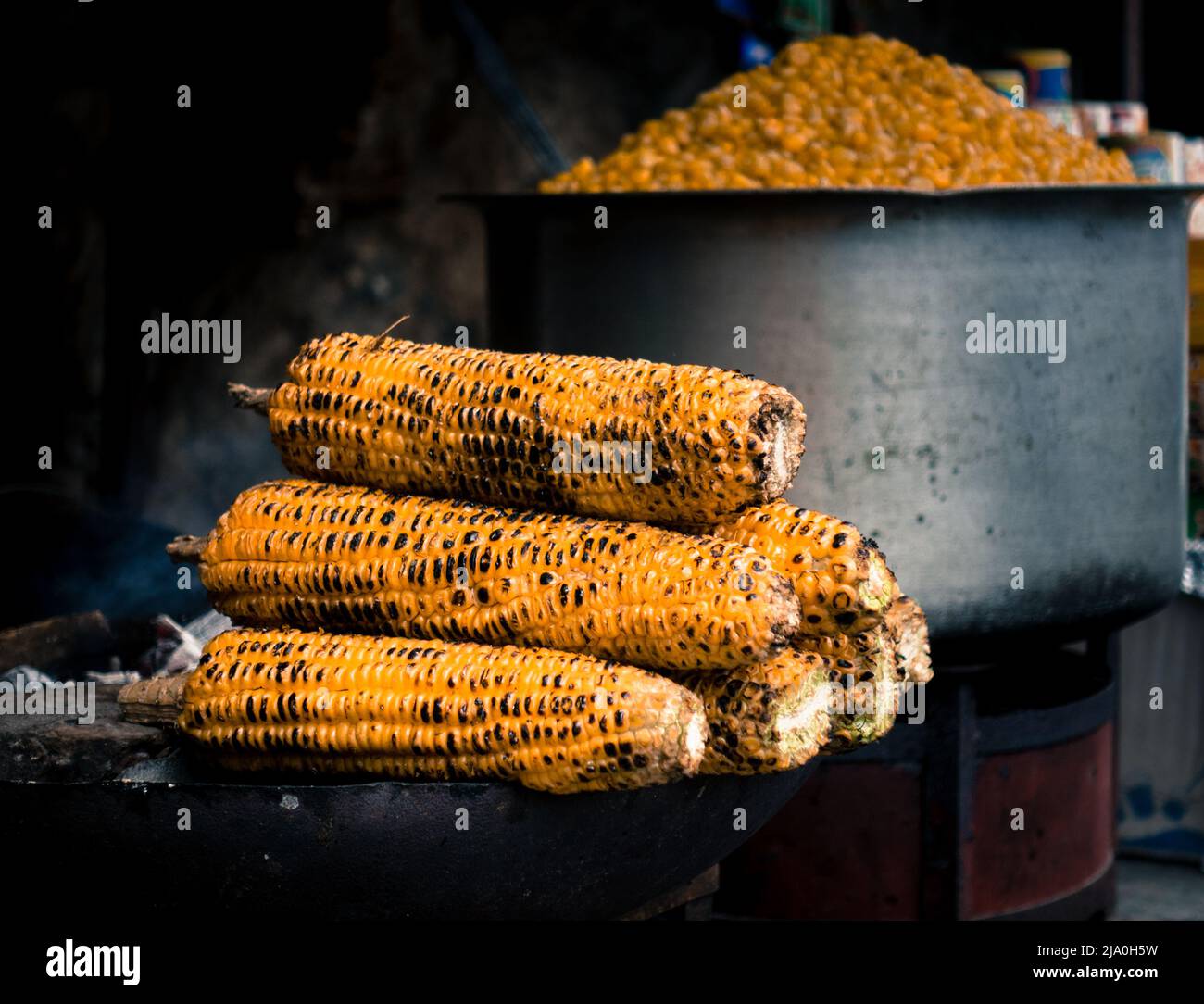A closeup shot of roasted corn or maze in the streets of Mussoorie ...