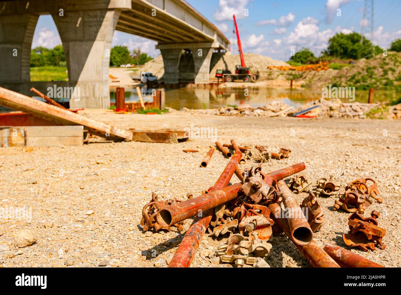 View on a heap of corrosion pipes disassembled steel scaffold joints ...