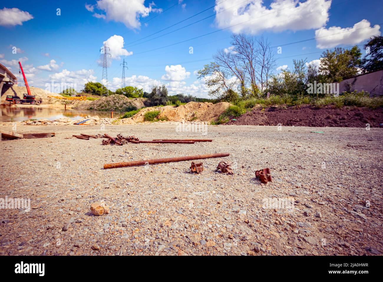 View on a heap of corrosion pipes disassembled steel scaffold joints ...