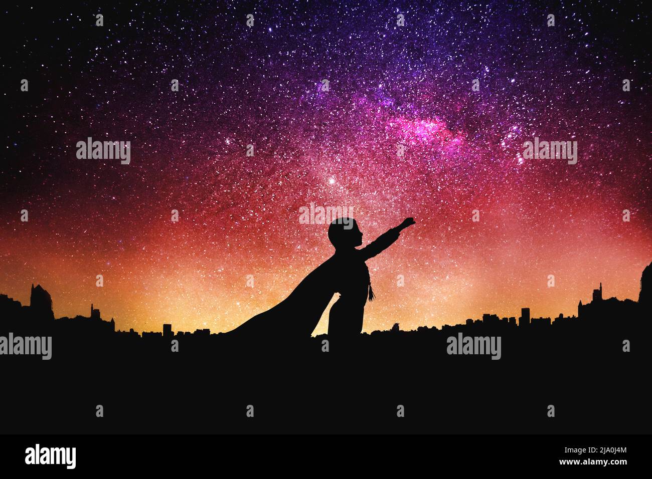 superhero silhouette at the night starry sky background Stock Photo - Alamy