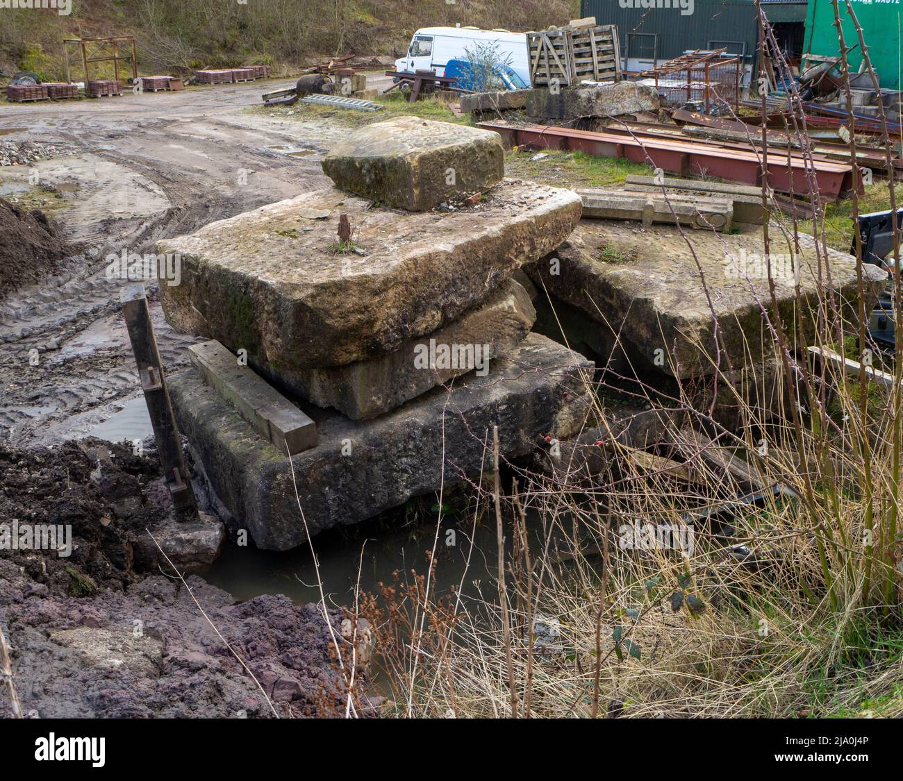 Square cut huge blocks of stone abandoned at a disused quarry Stock ...