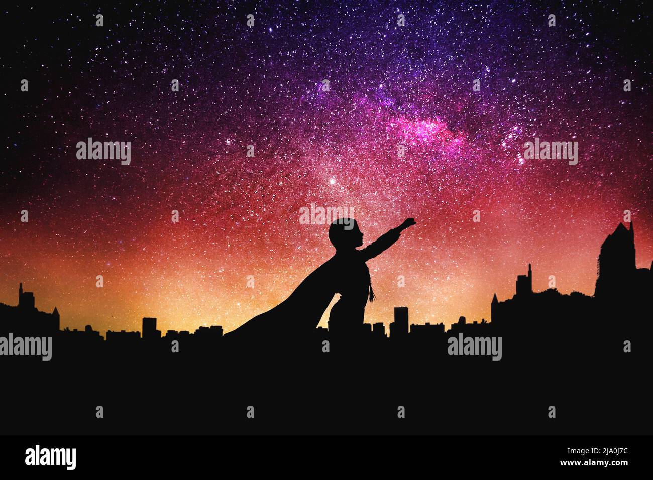 superhero at the night starry sky background. Mixed media Stock Photo ...