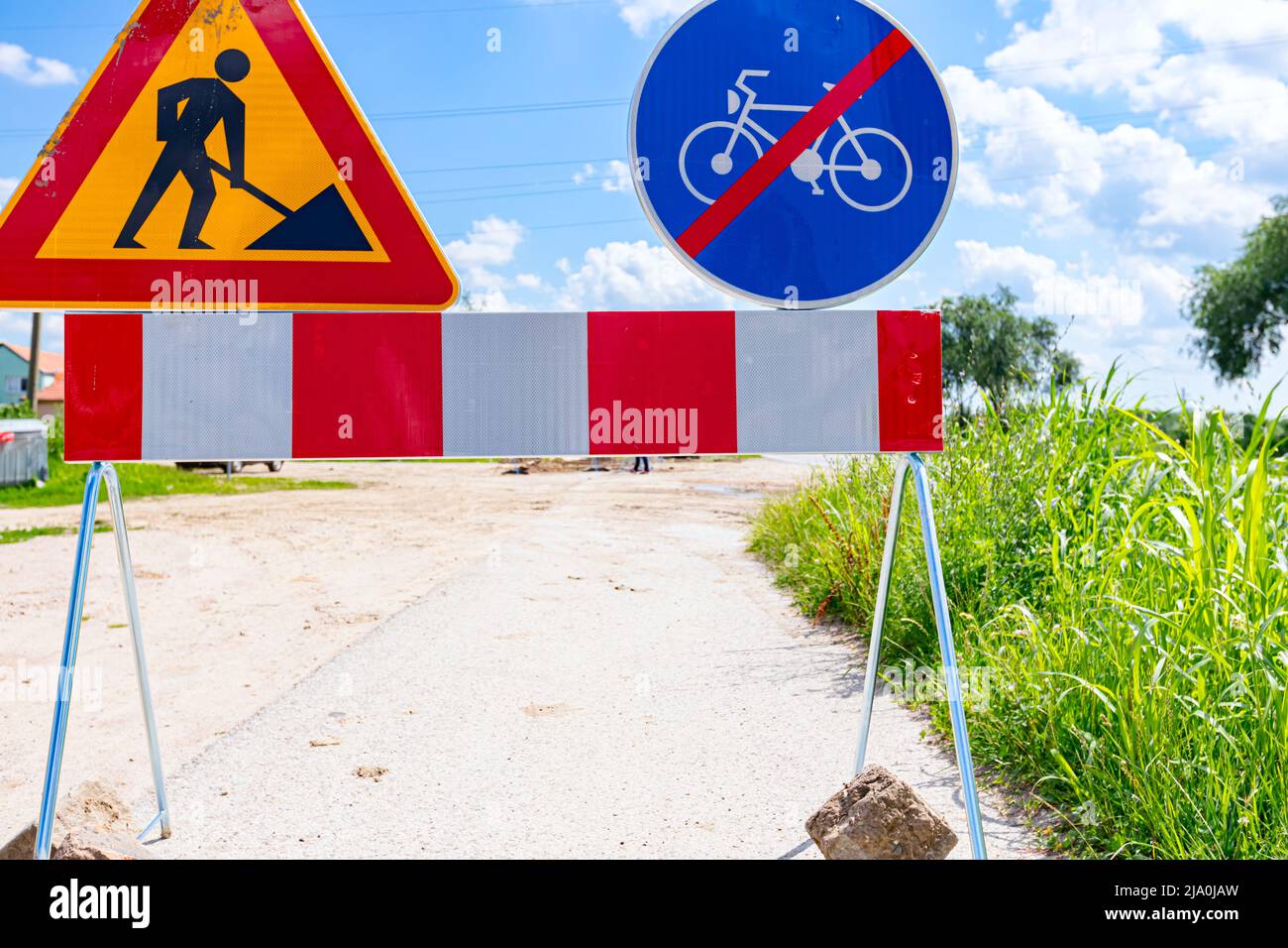 Two red triangle road signs hi-res stock photography and images - Alamy