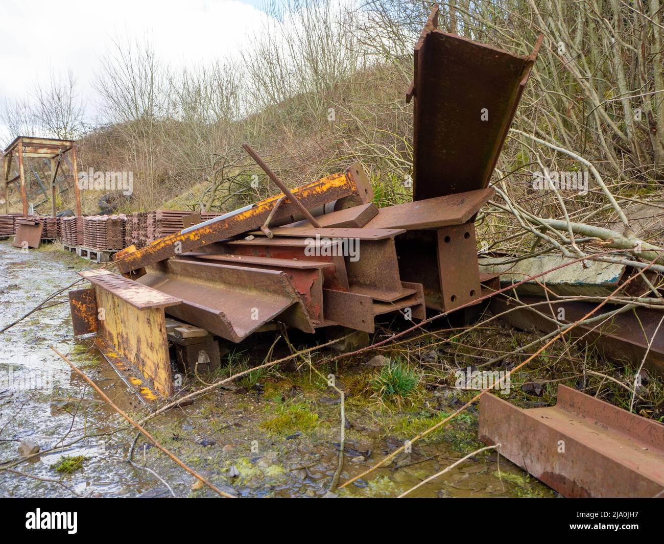 Pile of H shaped steel bars left in an old quarry to rust Stock Photo ...