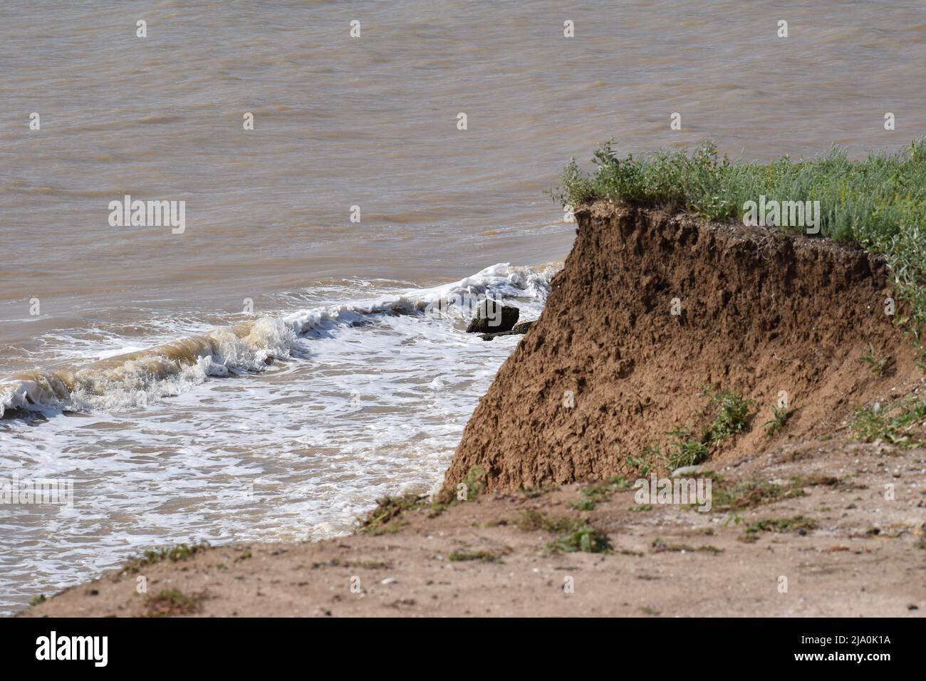 Sea cliffs of boulder clay in front of beaches. Clay Cliffs and Beach ...