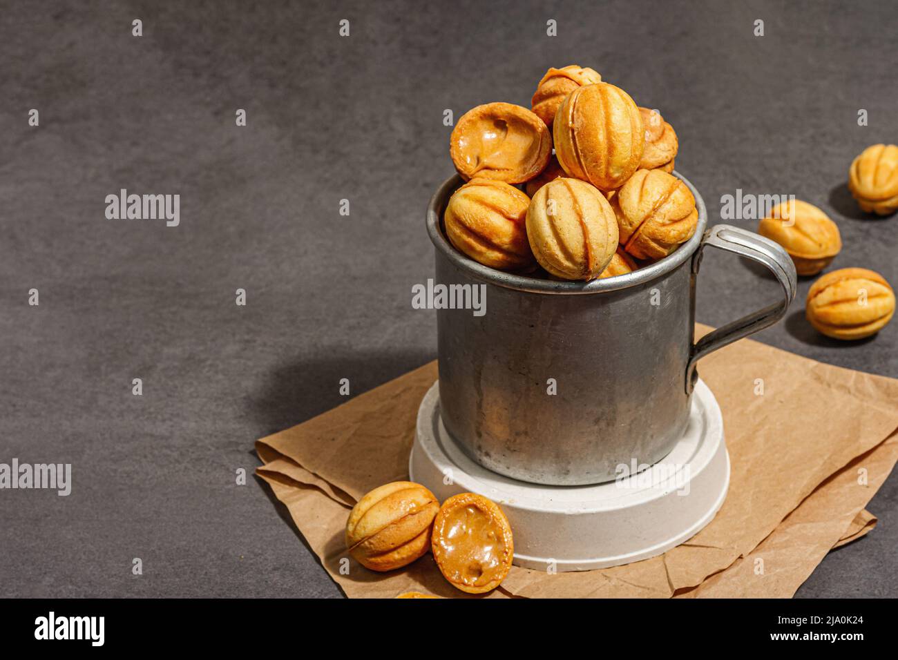 Cookies in the shape of walnuts with condensed milk cream filling ...