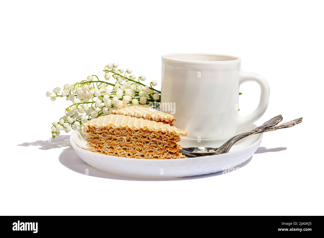 Cup of coffee and waffle cake isolated on a white background. Sweet ...