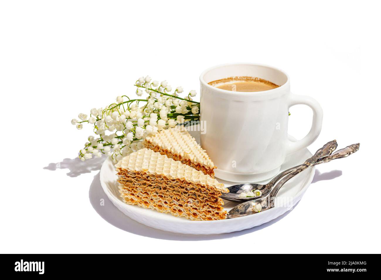 Cup of coffee and waffle cake isolated on a white background. Sweet ...