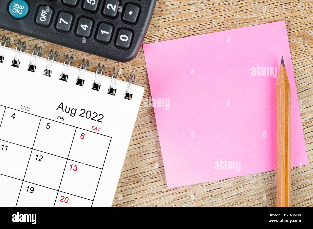 The Blank sticky note on August 2022 desk calendar on wooden background ...