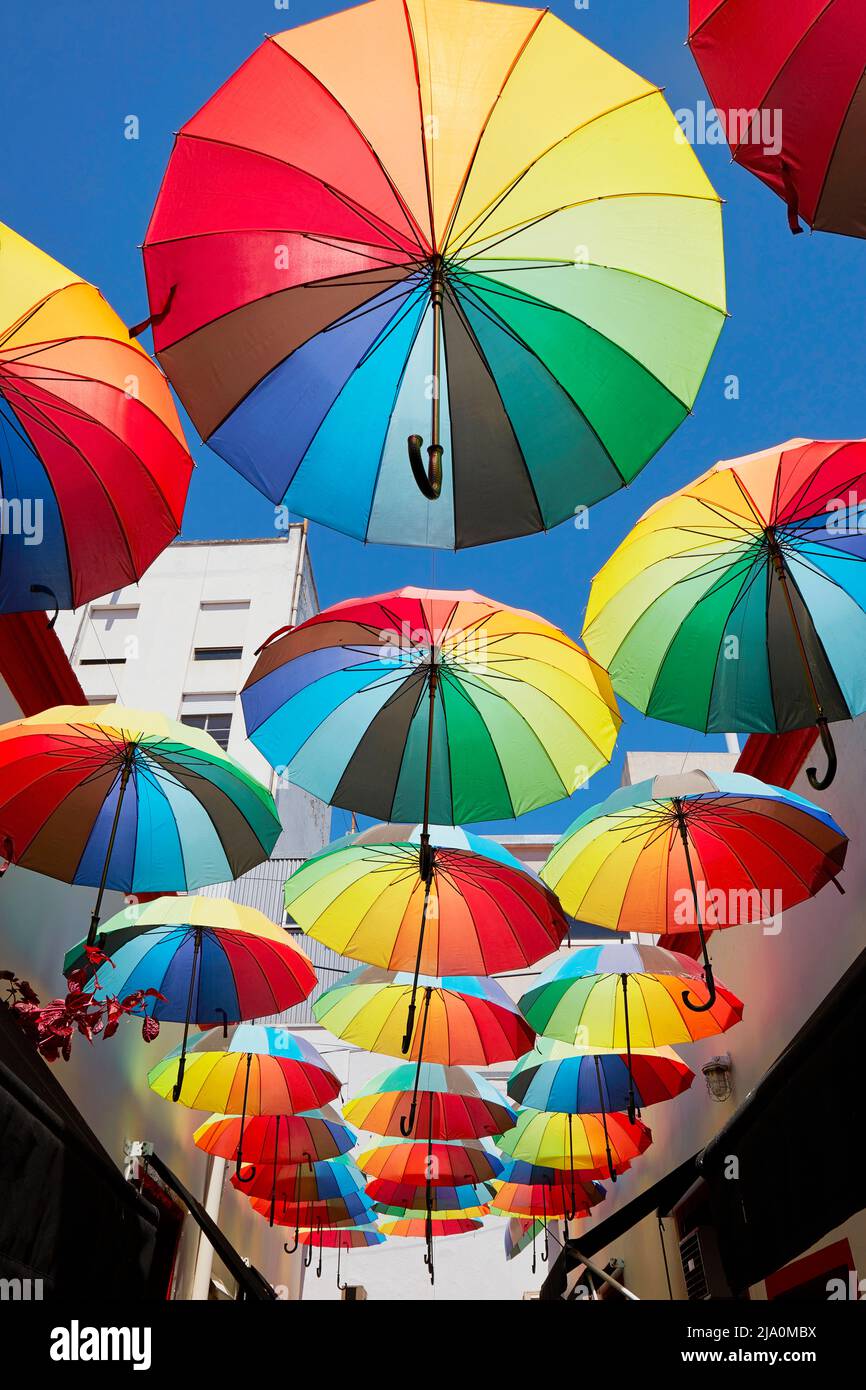 A colorful umbrella artistic installation inside the Solar de French ...