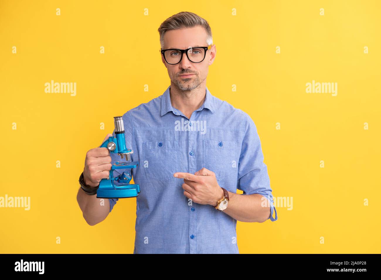 Man with microscope hi-res stock photography and images - Alamy