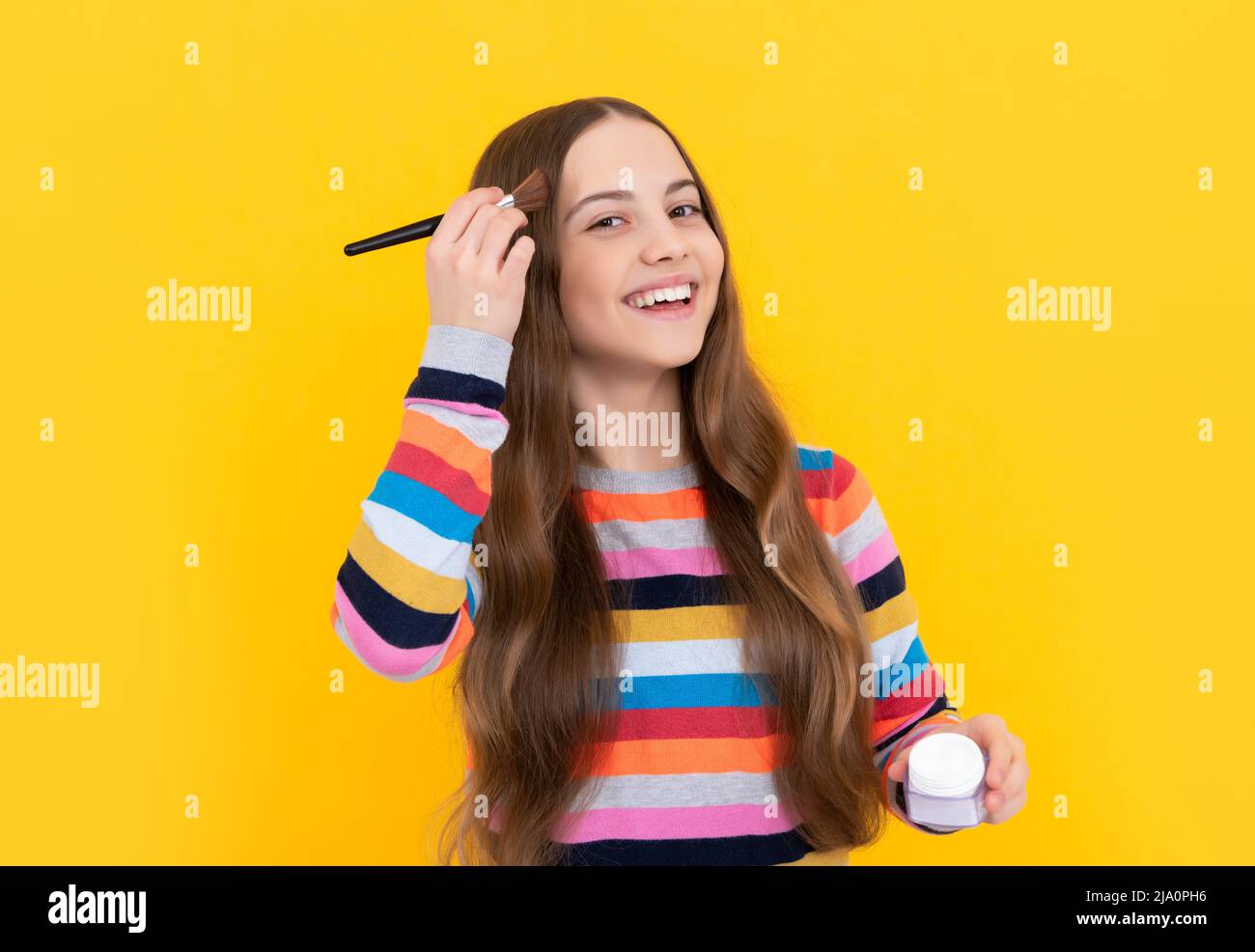Makeup gives you creative freedom. Happy girl child apply makeup. Where ...