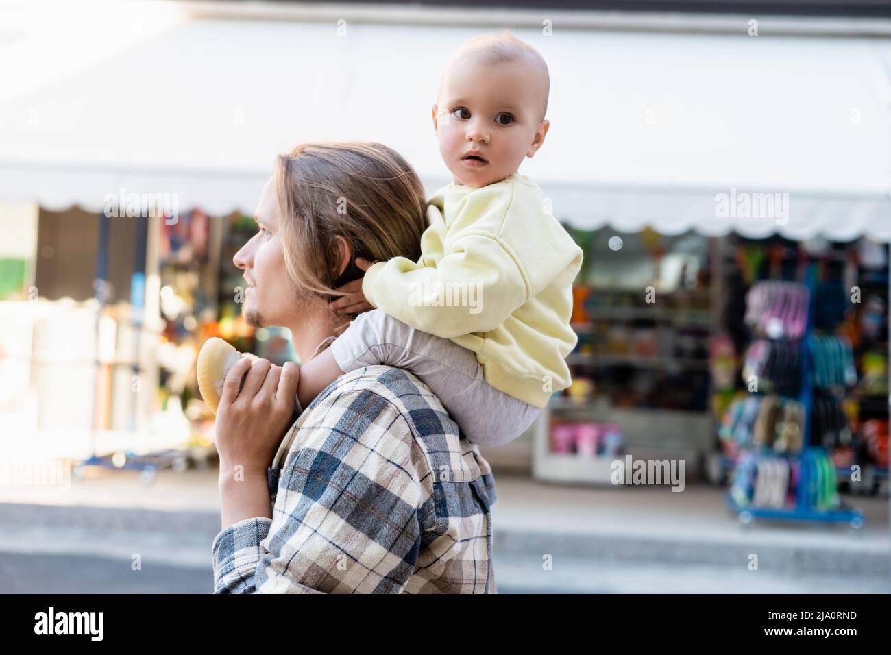 Man carrying baby hi-res stock photography and images - Alamy