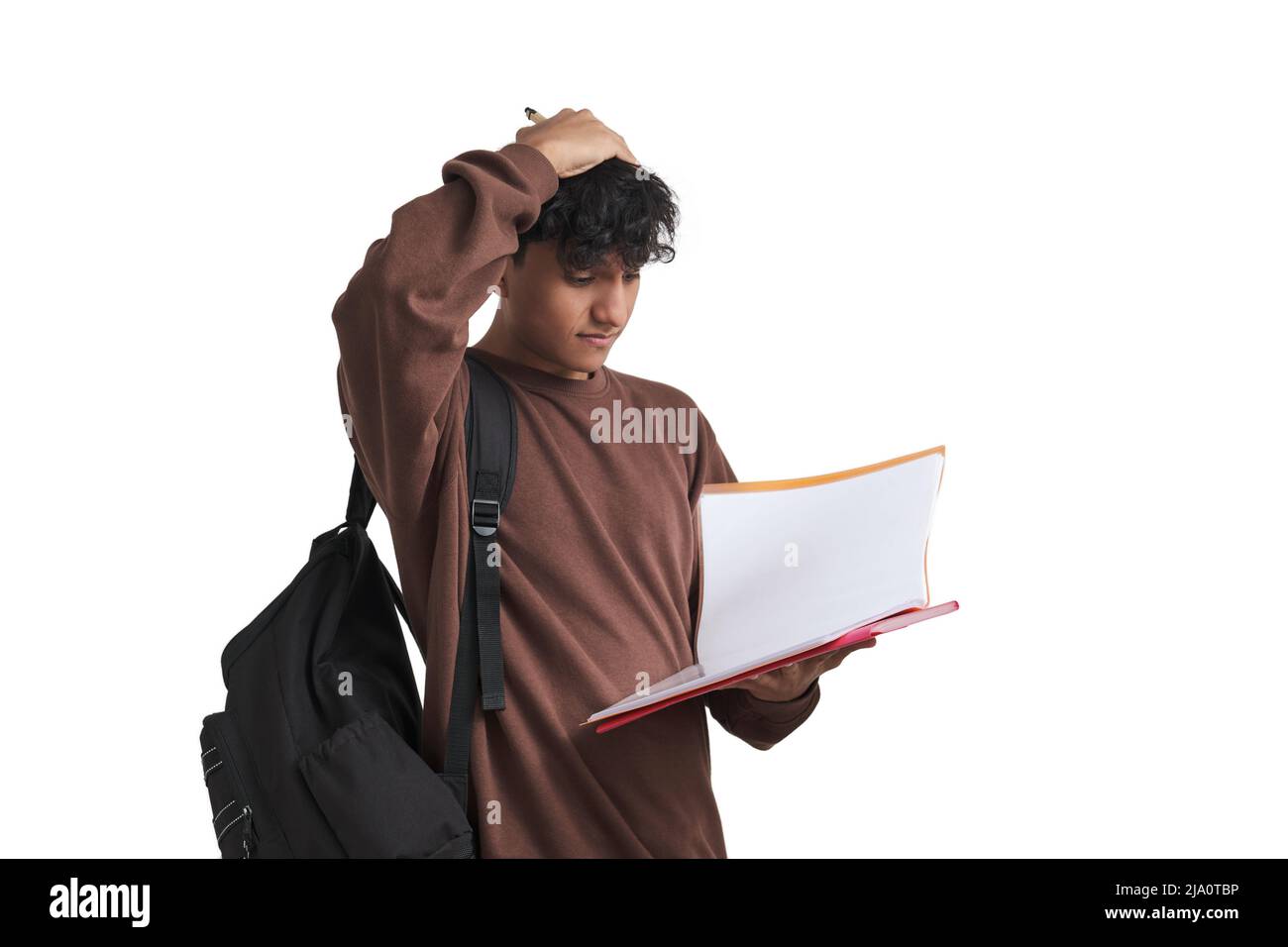 Young peruvian student noticing an error on his class notes, isolated ...
