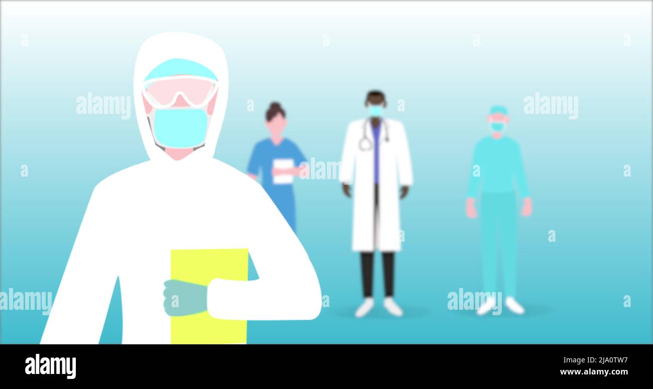 Image of a scientist standing with medical personnel standing in the ...