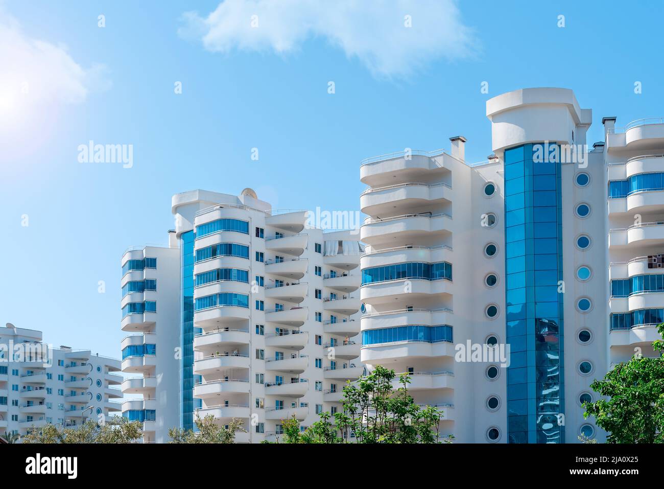 Fragments of the facades of modern multi-storey residential buildings ...