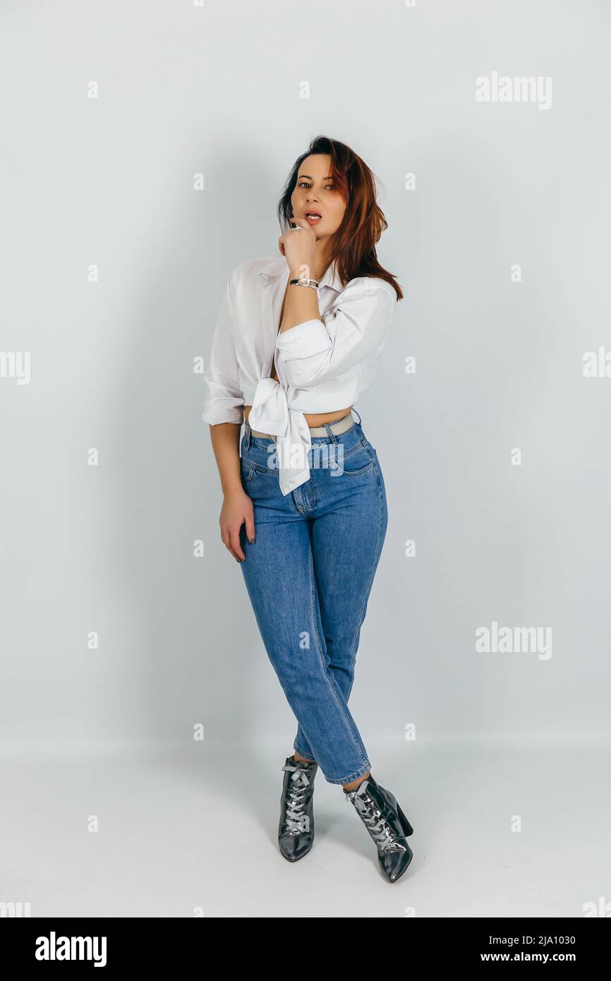 beautiful female model in a white shirt photo in the studio Stock Photo ...