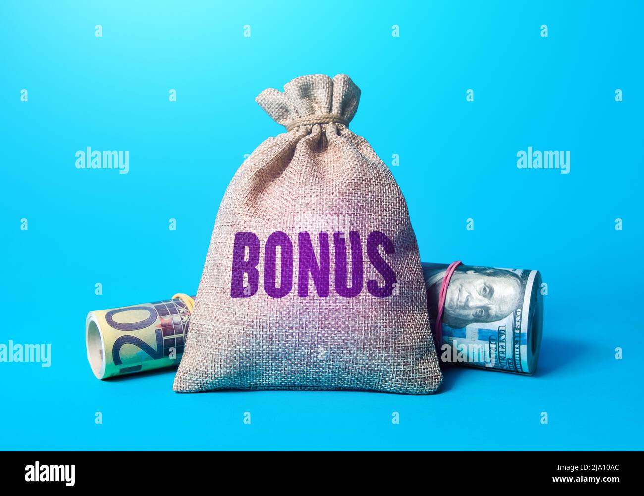 Money bag with word bonus. Rewarding employees with financial benefits ...