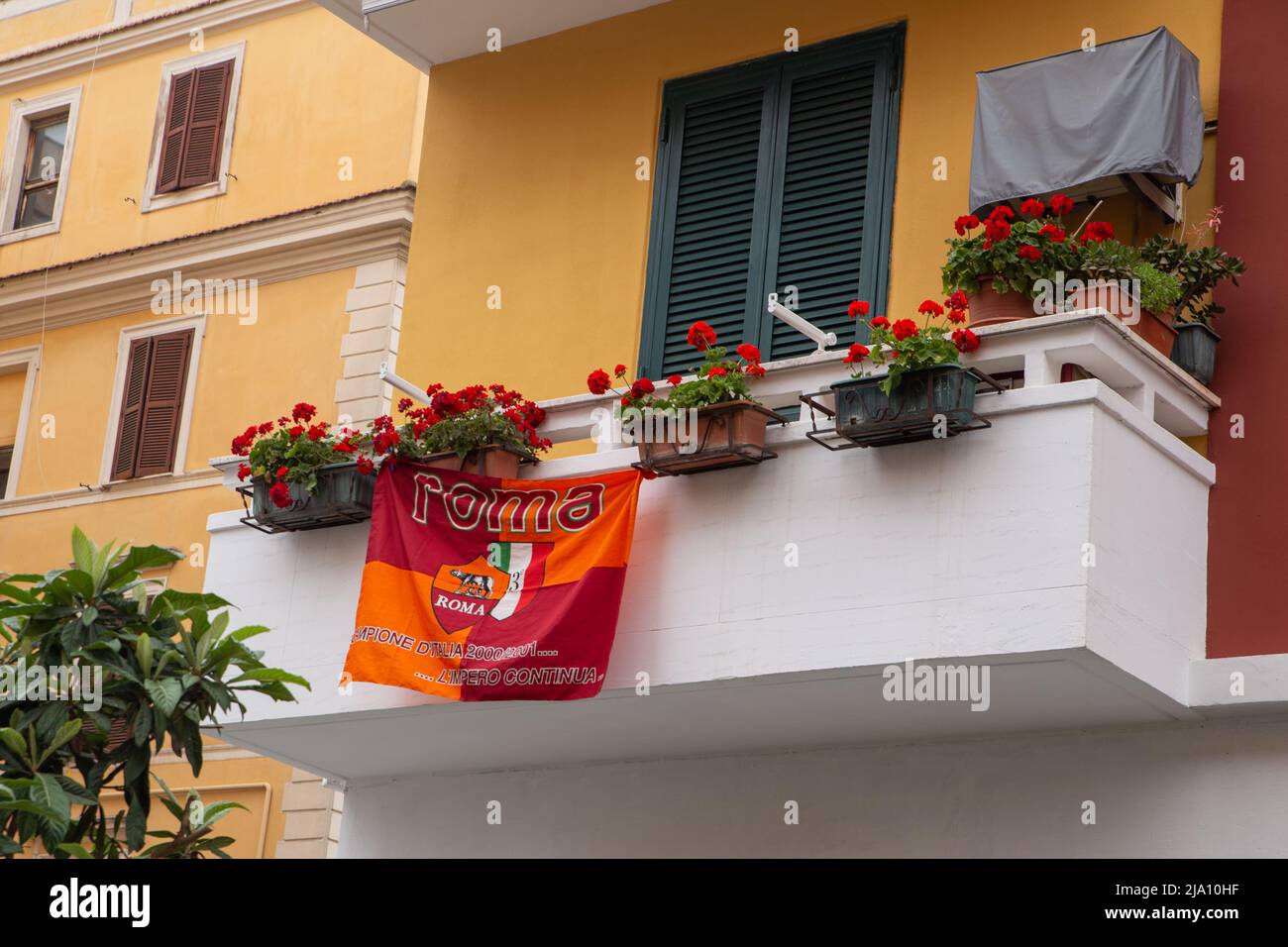 Rome, Italy. 26th May, 2022. AS Roma flag displayed in the Testaccio ...