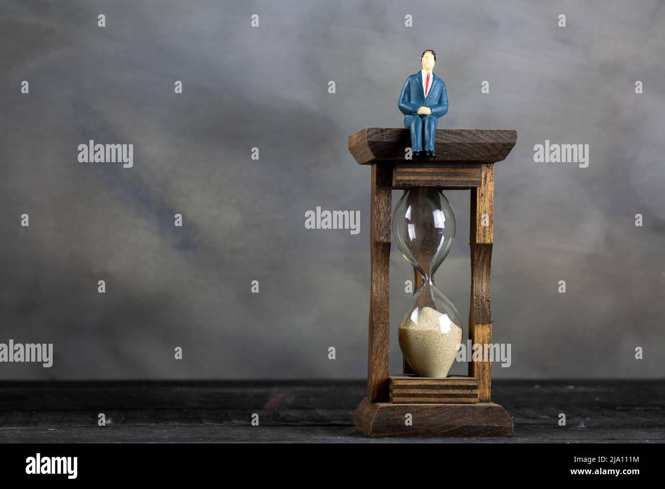 hourglass and man, Time Concept Stock Photo - Alamy