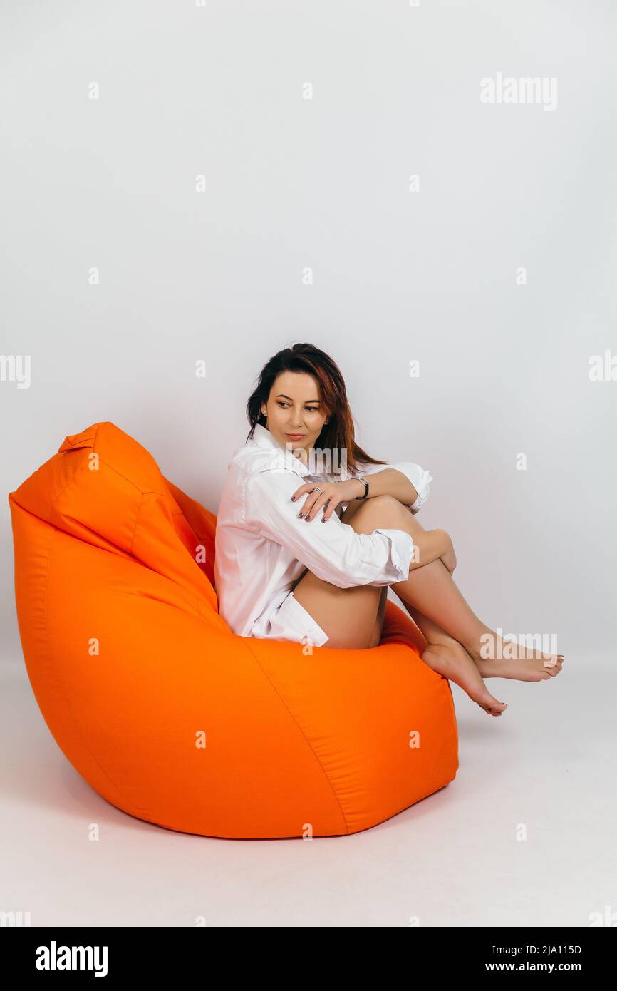 beautiful female model in a white shirt photo in the studio Stock Photo ...