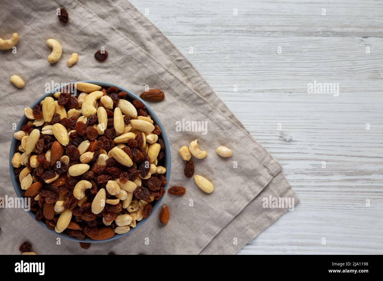 Raw Trail Mix with Nuts and Fruits in a Bowl, top view. Flat lay ...