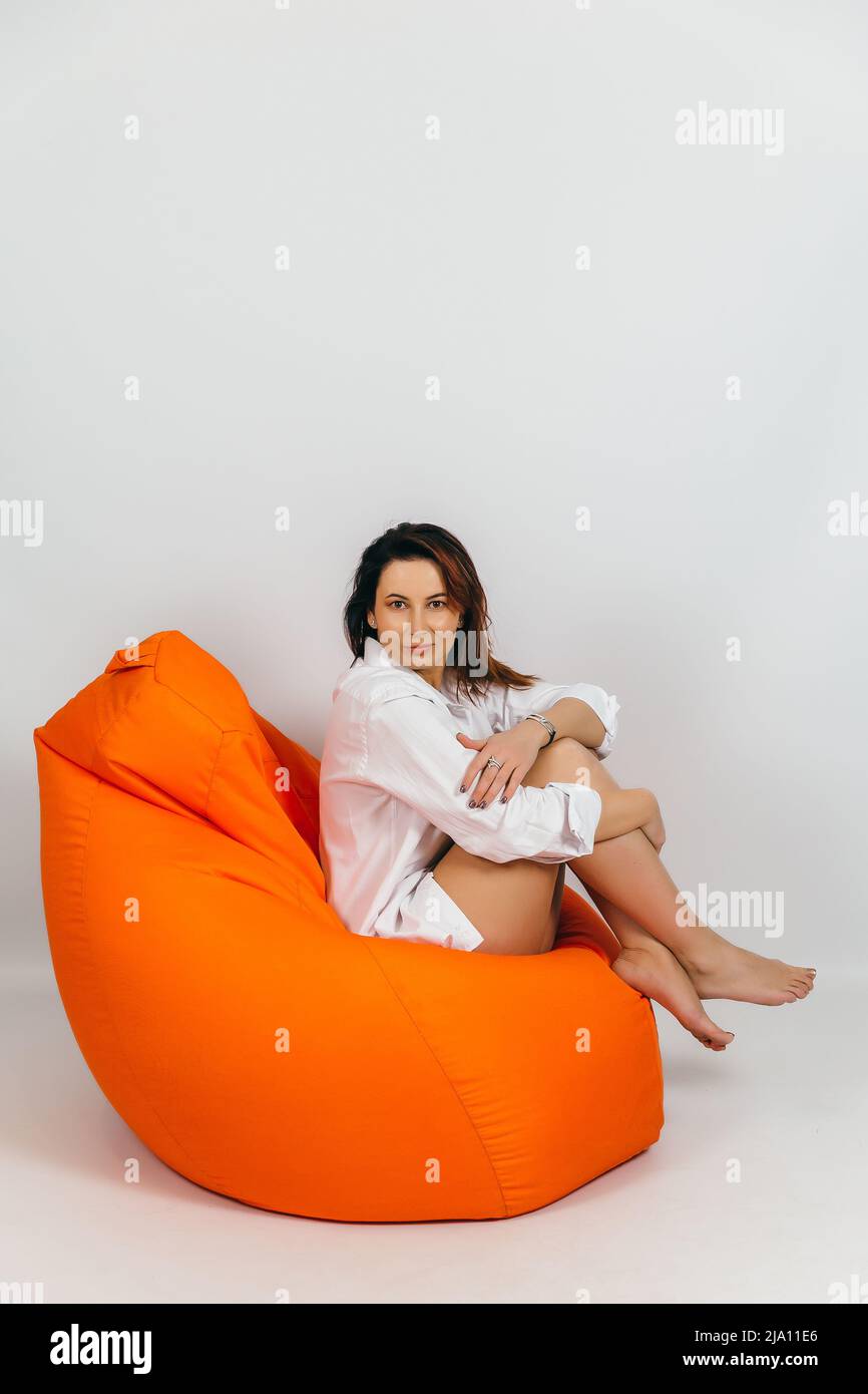 beautiful female model in a white shirt photo in the studio Stock Photo ...