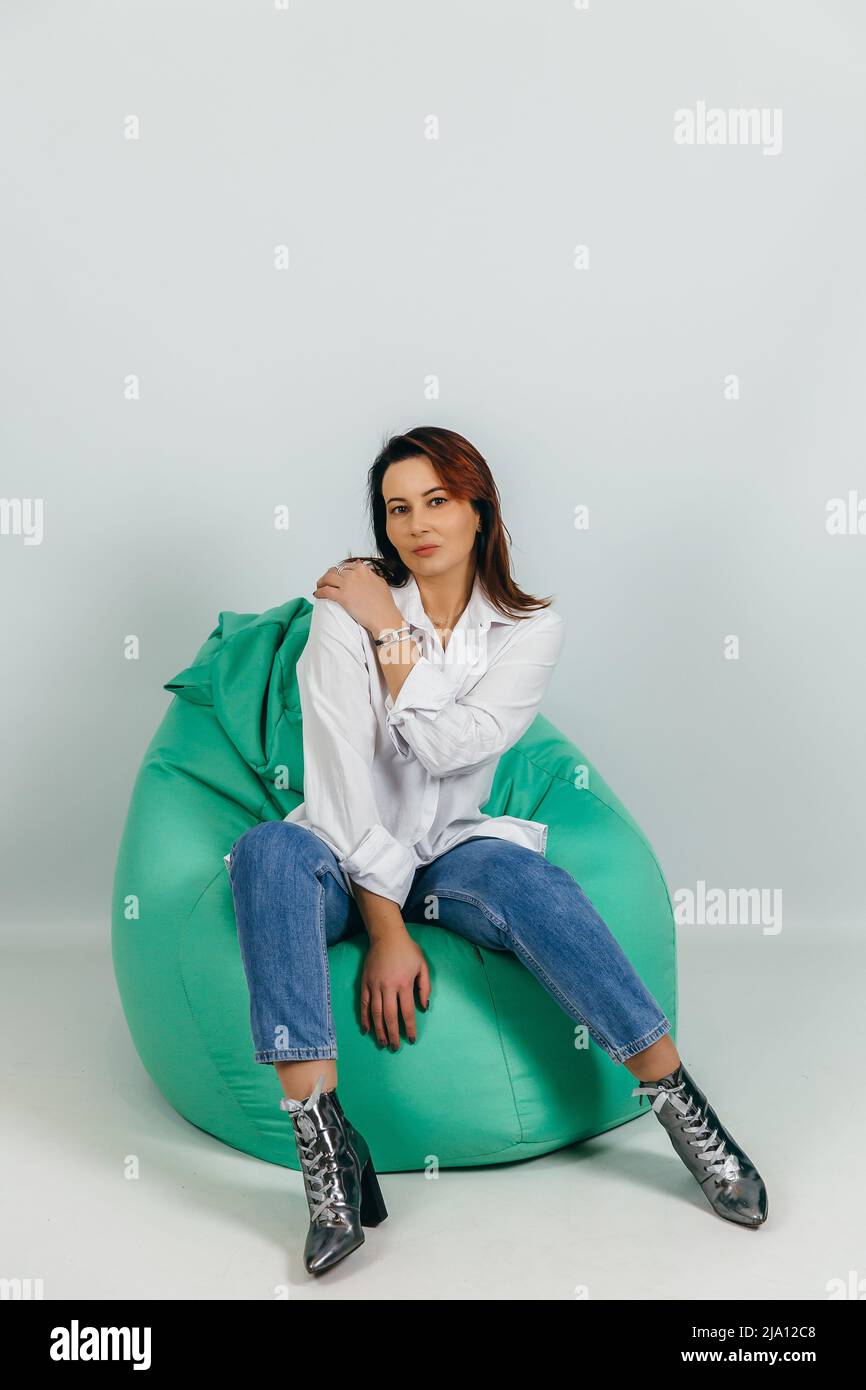 beautiful female model in a white shirt photo in the studio Stock Photo ...