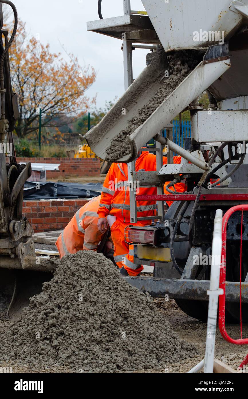 Ready mix semi-dry concrete delivered on construction site and ...