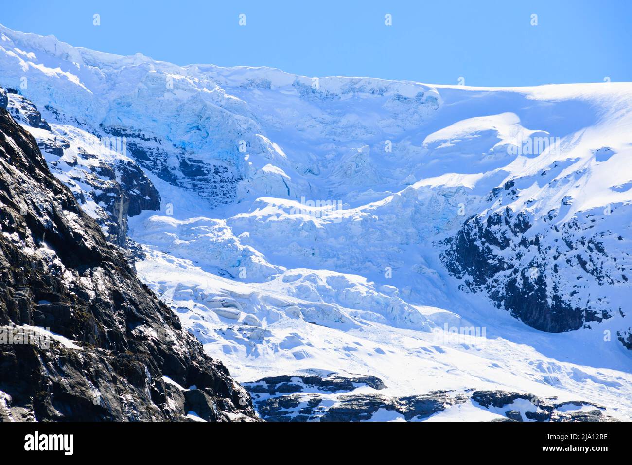 Snow covered Kjenndal glacier spur, Norway Stock Photo - Alamy