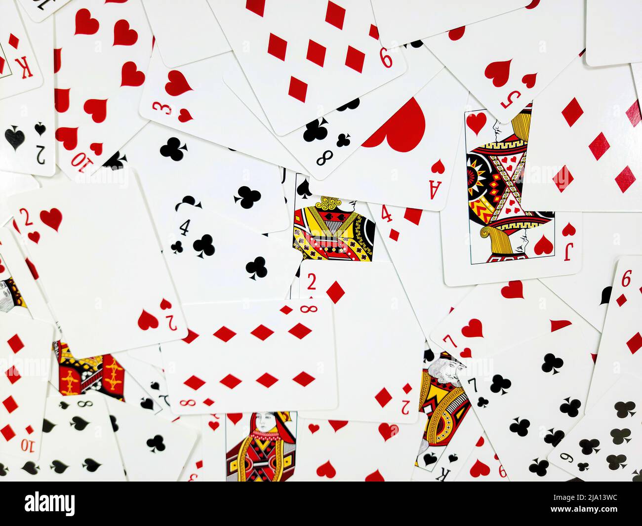 Scattered playing cards collection background Stock Photo - Alamy