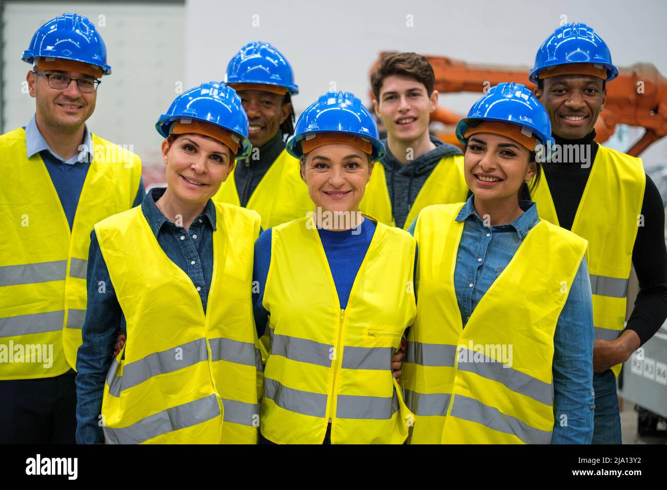 Group of engineers in factory working together Stock Photo - Alamy