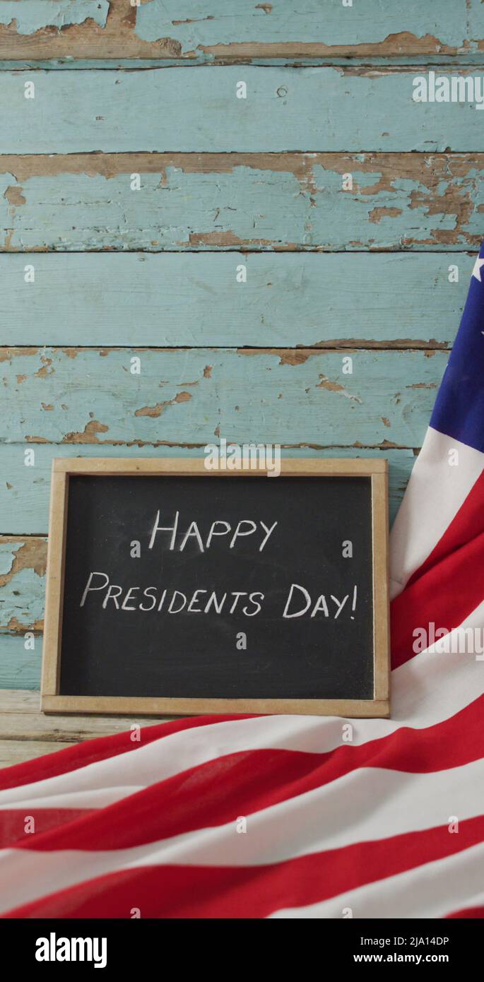 Vertical image of happy presidents day text on chalkboard with american ...