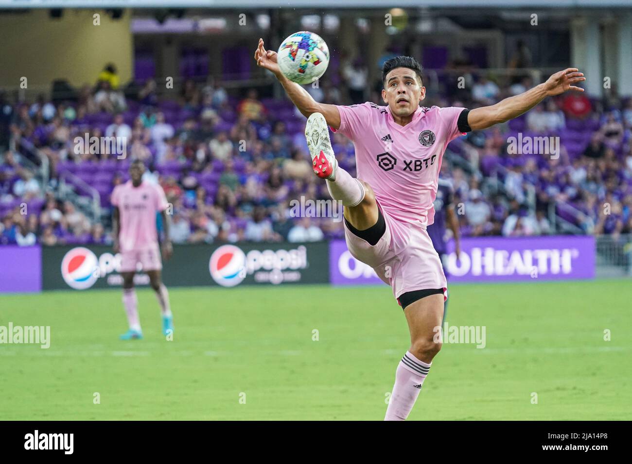 Orlando, Florida, USA, May 25, 2022, Inter Miami player Victor Ulloa #13 attempt to get a pass ...