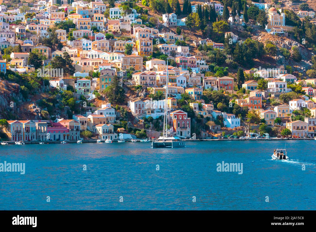 View of traditional colorful houses on Symi island, Greece, Dodecanese ...