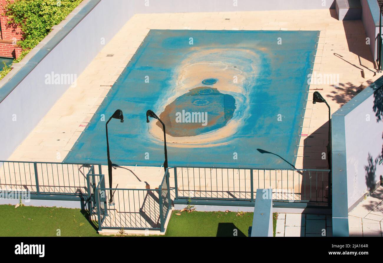 Empty abandoned swimming pool in moon time. Pool without water in ...